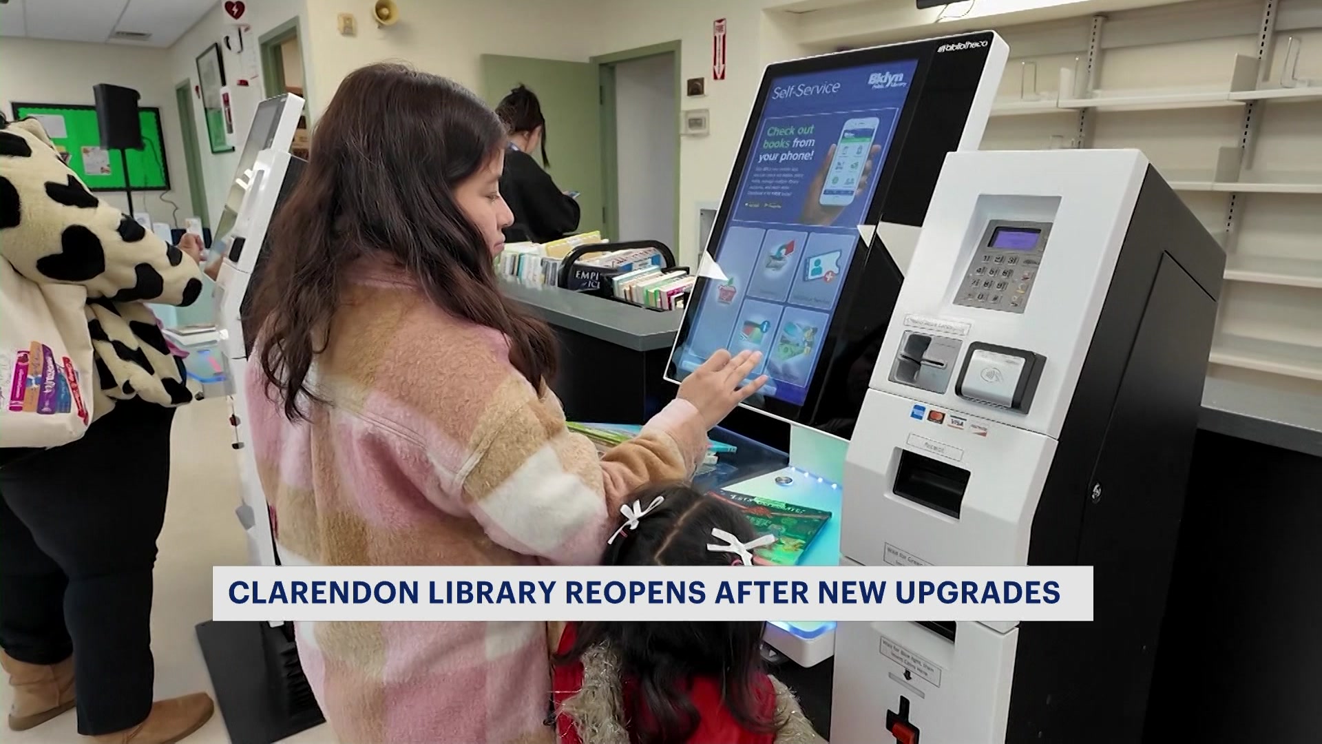 News 12 | New York | Clarendon Library reopens on Nostrand Avenue ...