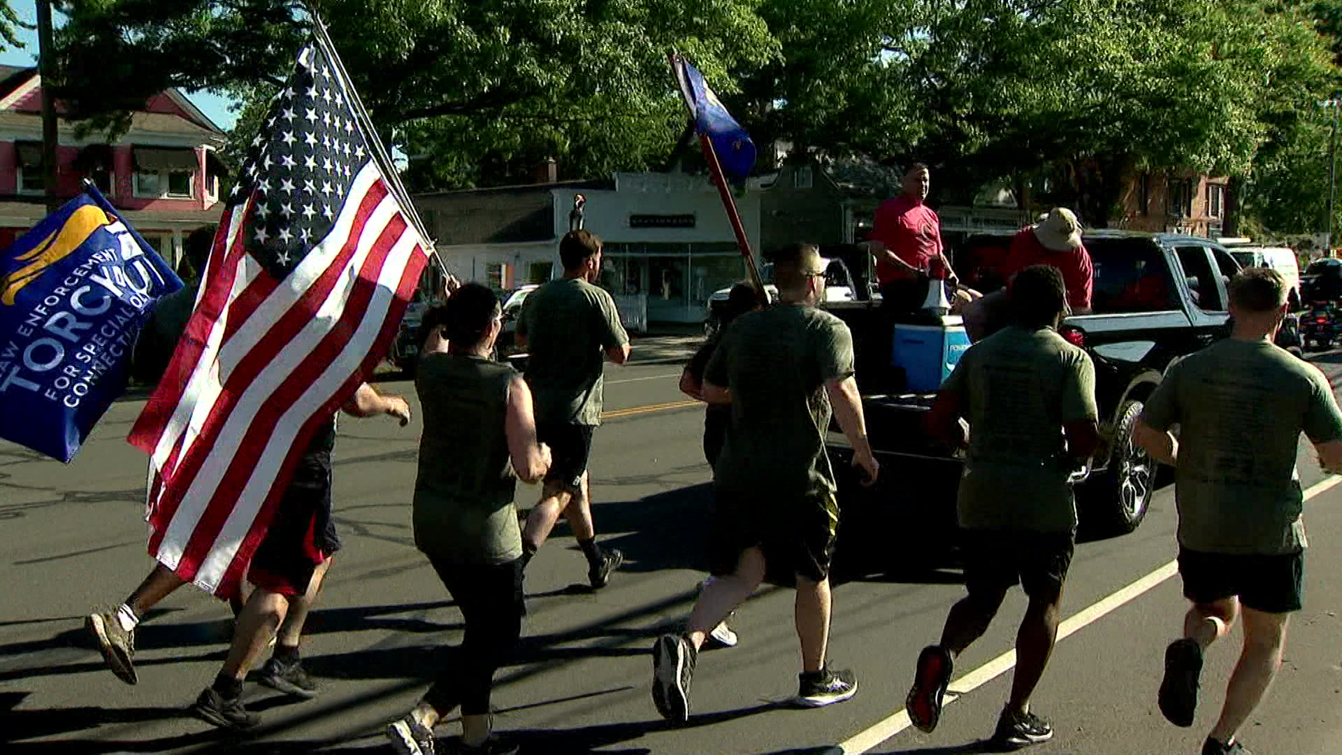 Police officers carry torch across the state for Special Olympics ...