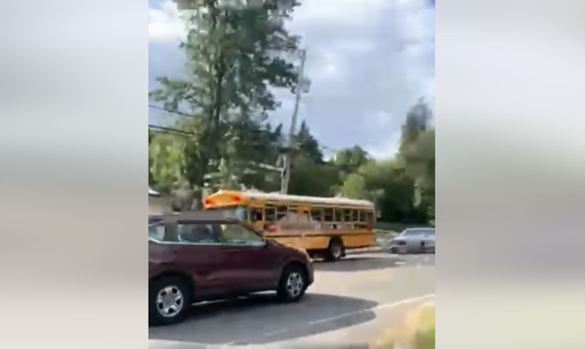 Police post video of car zooming past school bus with stop sign flashing