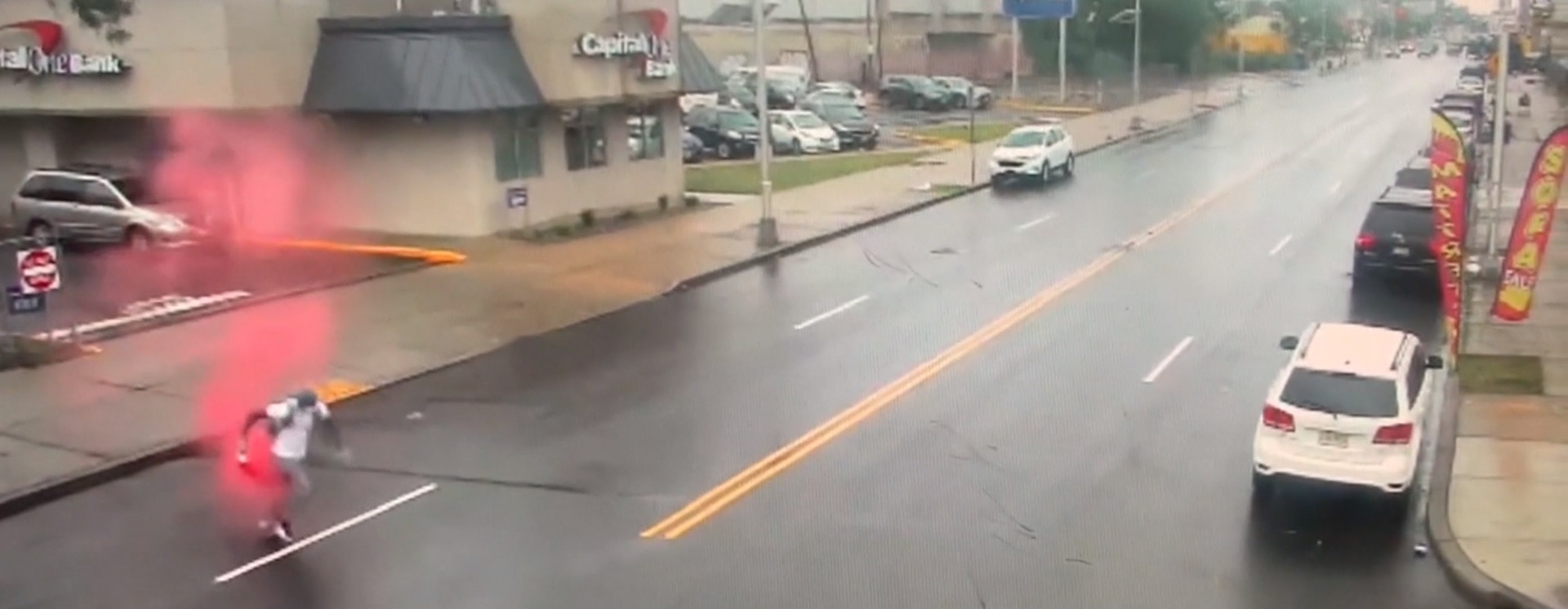 Authorities: Bank robbery suspect seen on camera as red dye pack ...