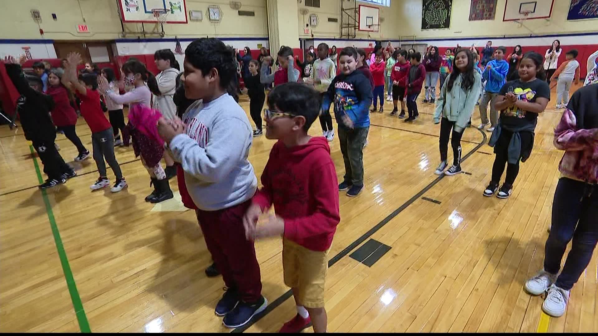 Elementary school students learn about Hispanic culture in dancing workshop