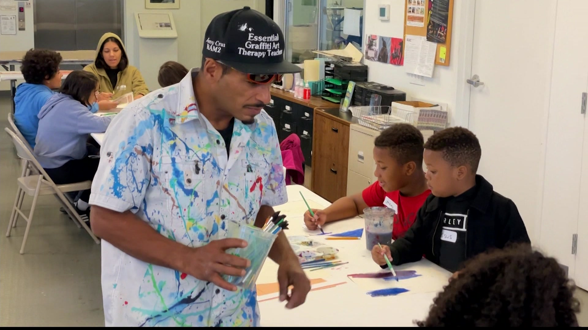 Graffiti artist awards art scholarships to students with disabilities