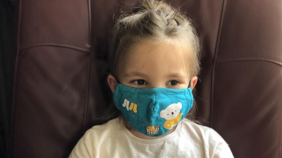 Trying to pick the best face covering for your child? This guide of 4 ...