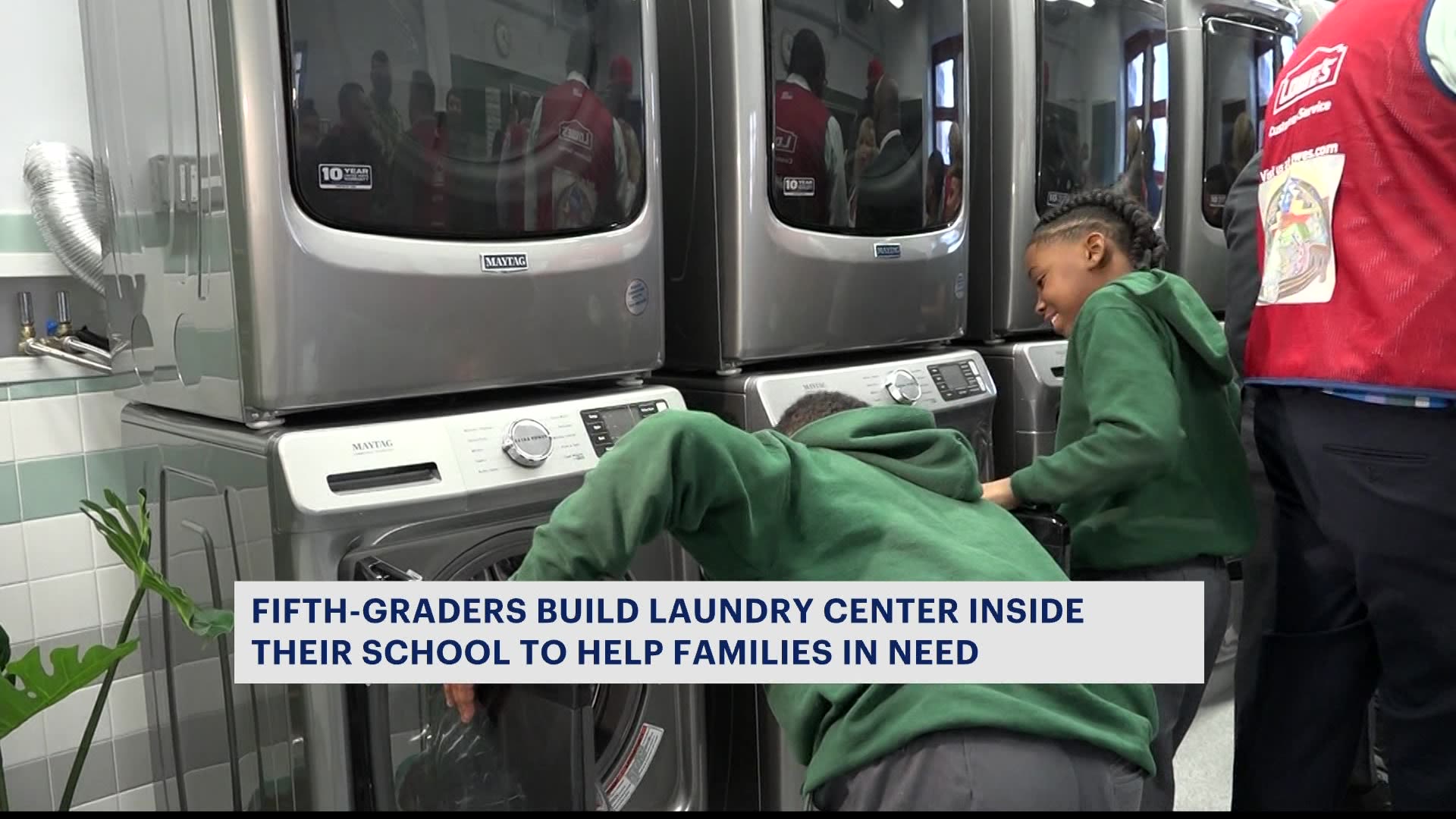 Elementary school students build laundromat in building