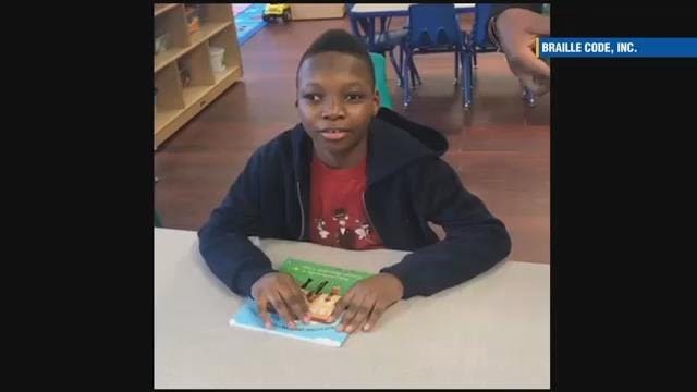 Mother and son teach kids about being visually impaired