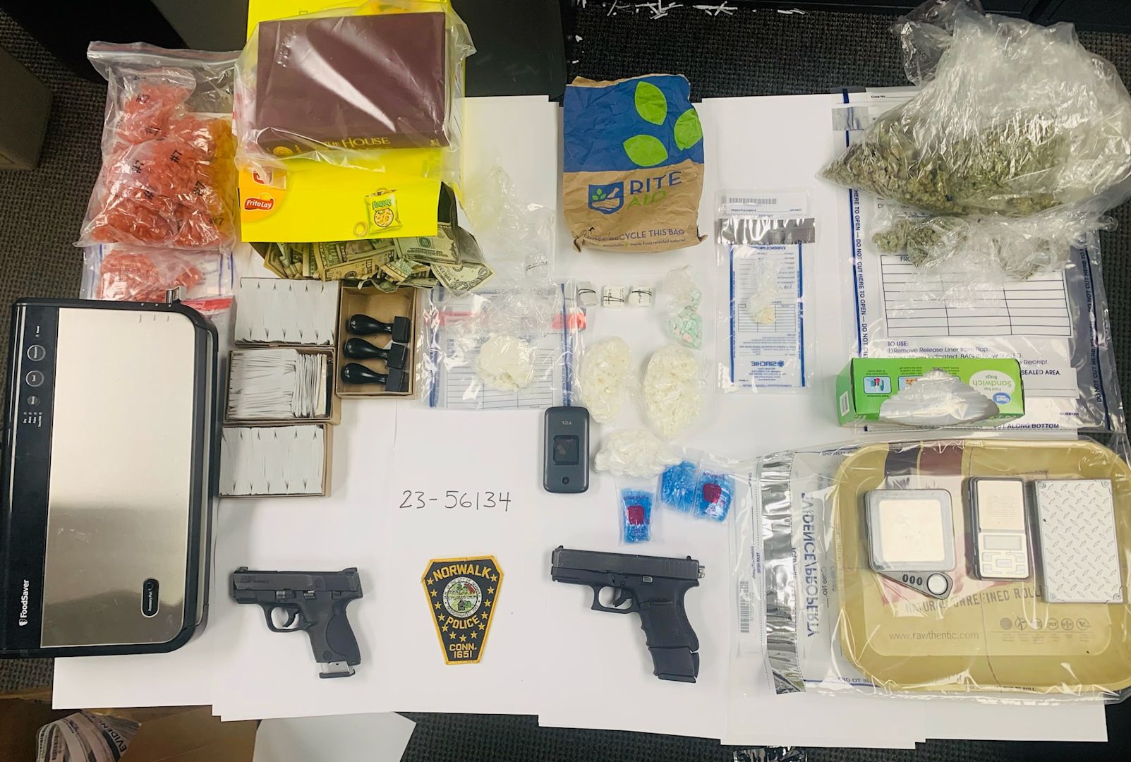 Police seize crack cocaine, pure fentanyl, other drugs, guns and ...