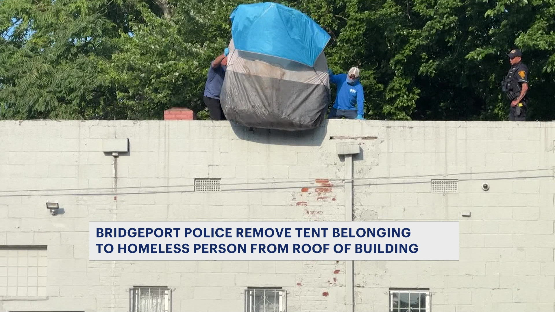 News 12 | New York | Tent used by homeless person removed from roof of ...