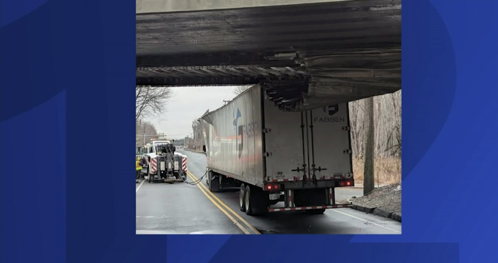 News 12 | New Jersey | Tractor Trailer Strikes Overpass In Holmdel