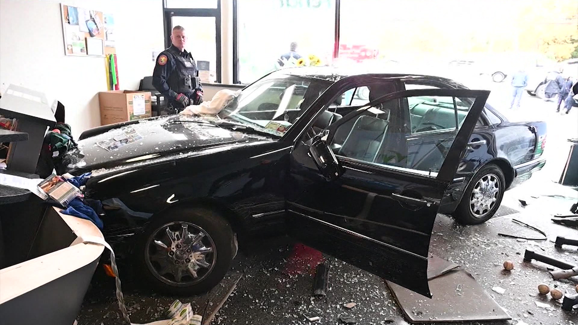Car drives through Syosset storefront at the Muttontown Plaza