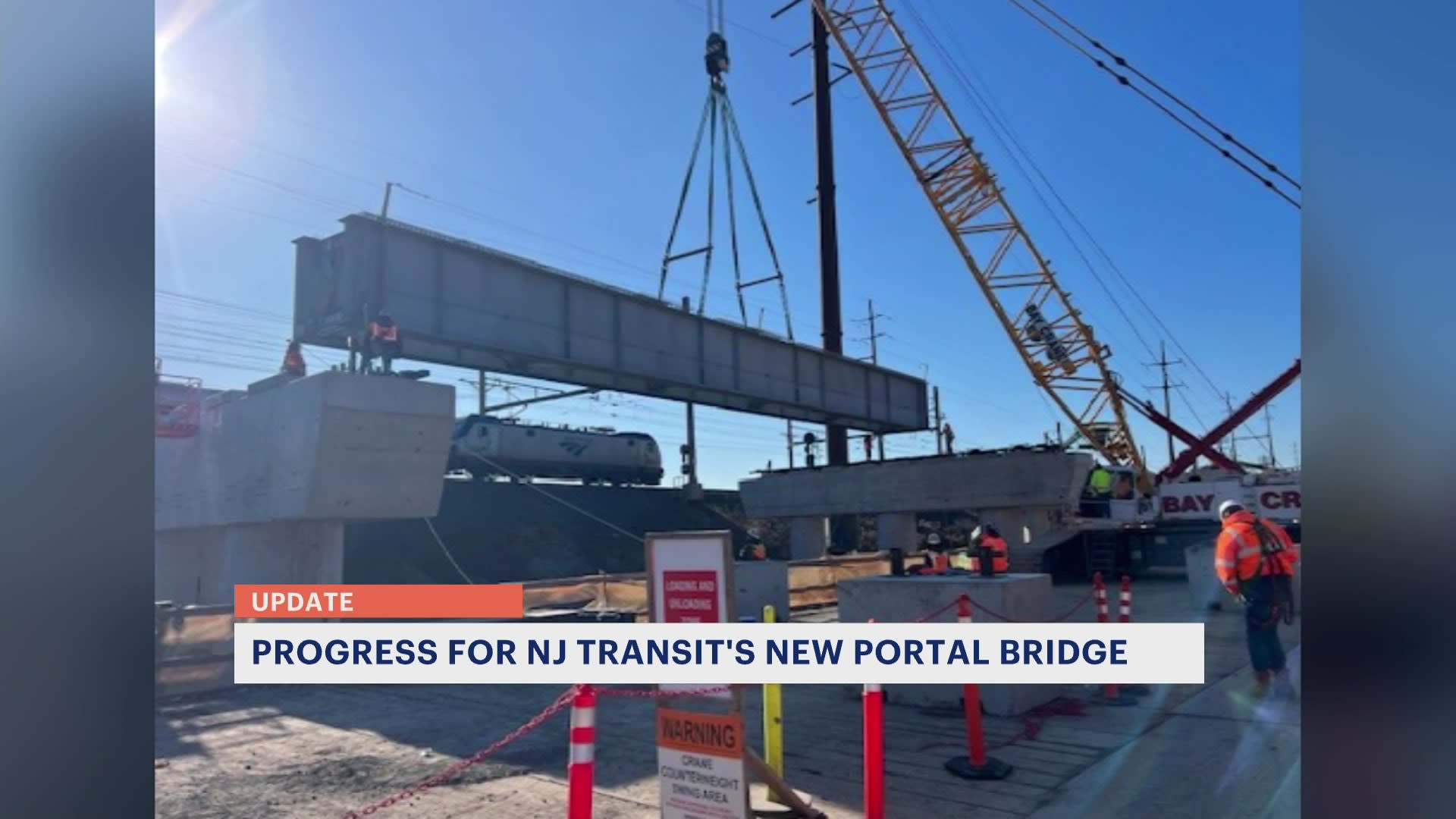 First steel beam of new Portal Bridge hoisted into position