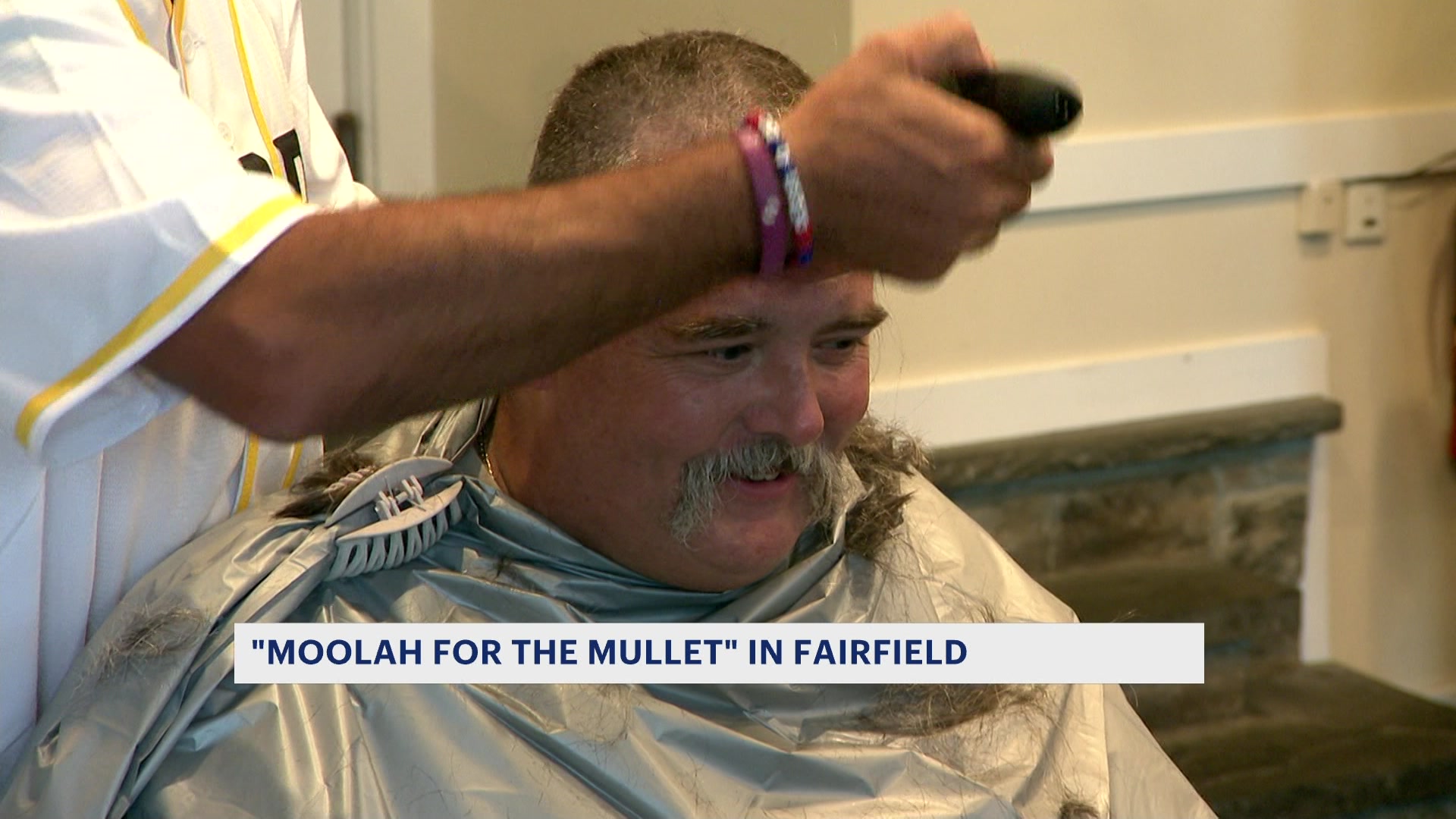Fairfield fire lieutenant shaves mullet grown out for 798 days for charity