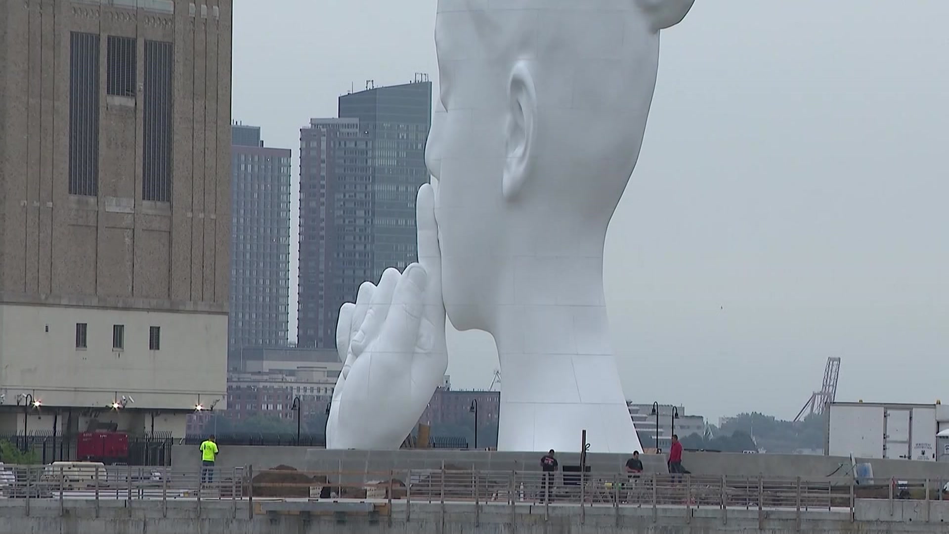 Giant sculpture of 'shushing' woman turning heads in Jersey City