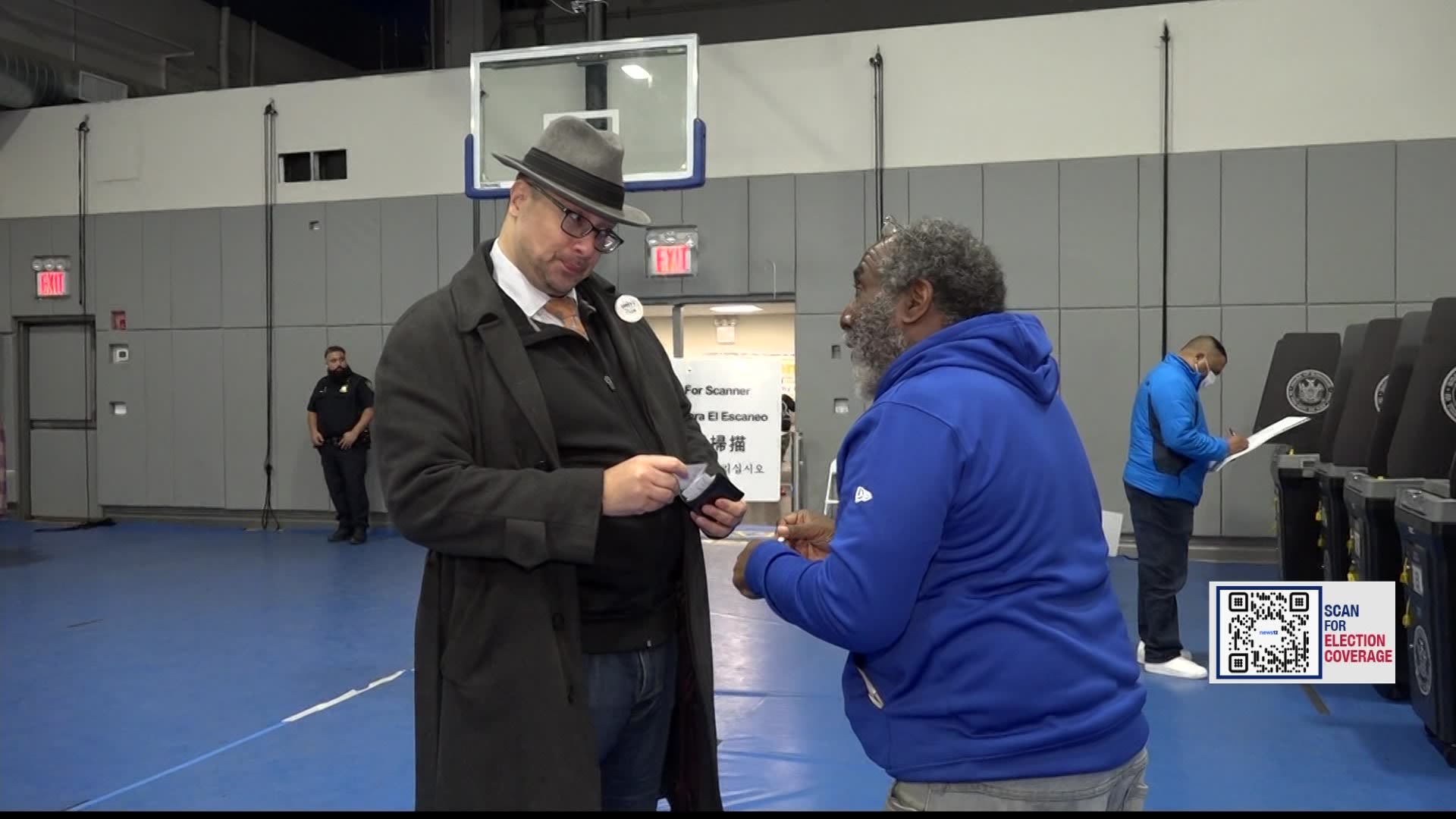 State Sen. Gustavo Rivera greets Bronx residents at the polls