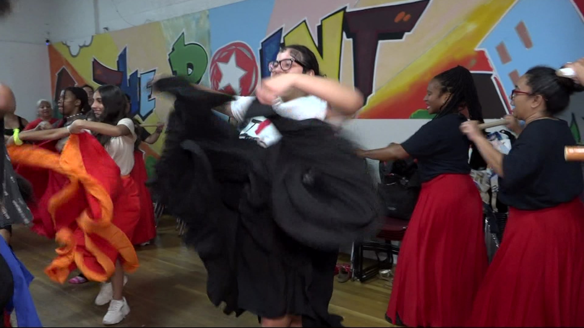 Dancers from Bombazo Dance Company gear up ahead of the Puerto Rican ...