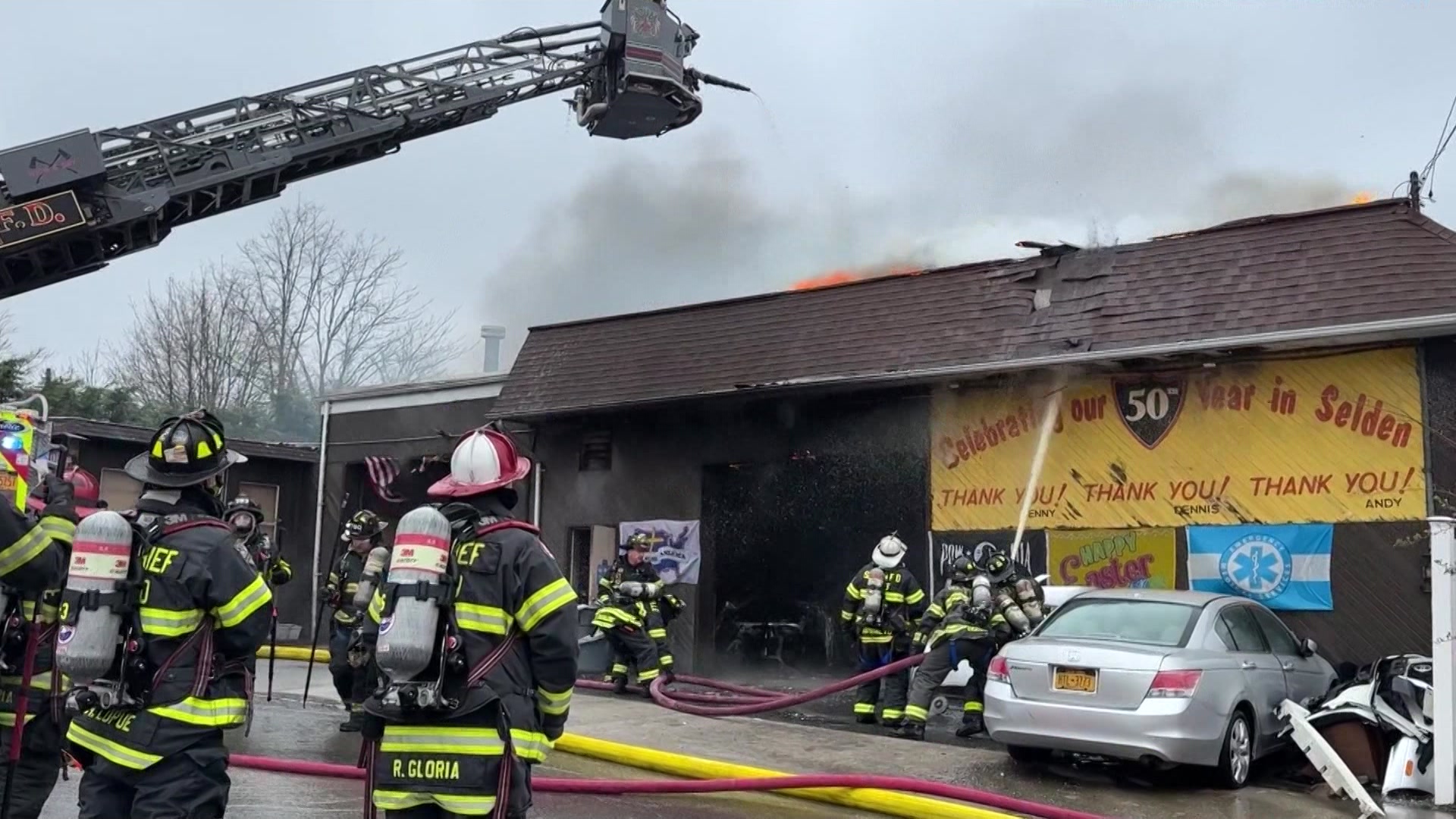 Fire erupts at Selden auto body shop