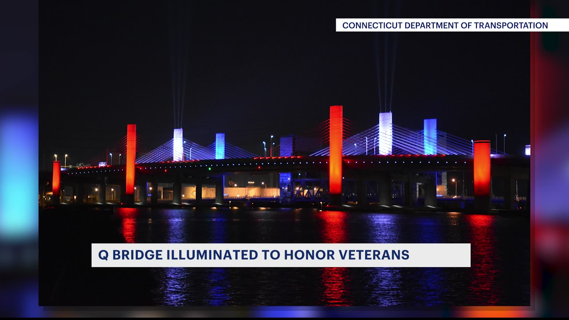 Q Bridge shines in red, white, and blue in honor of Veterans Day