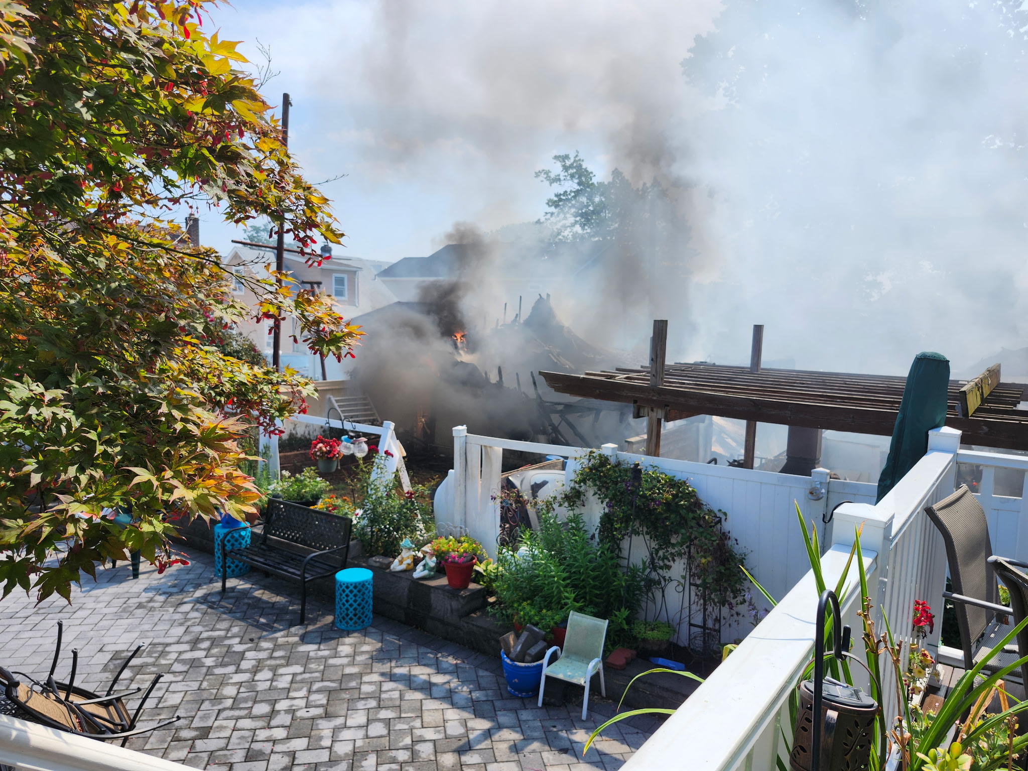 Firefighter hospitalized after responding to Carteret garage fire