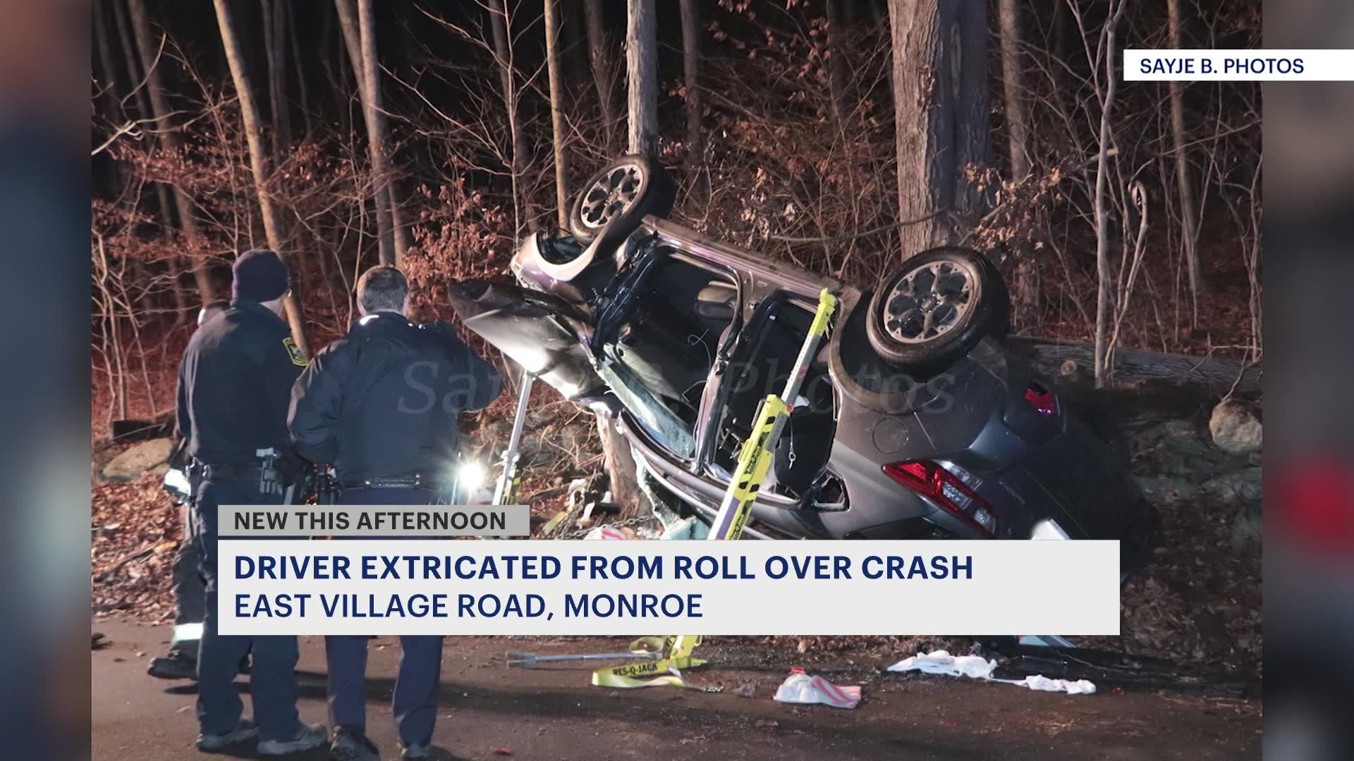 Monroe first responders help remove driver from rollover crash