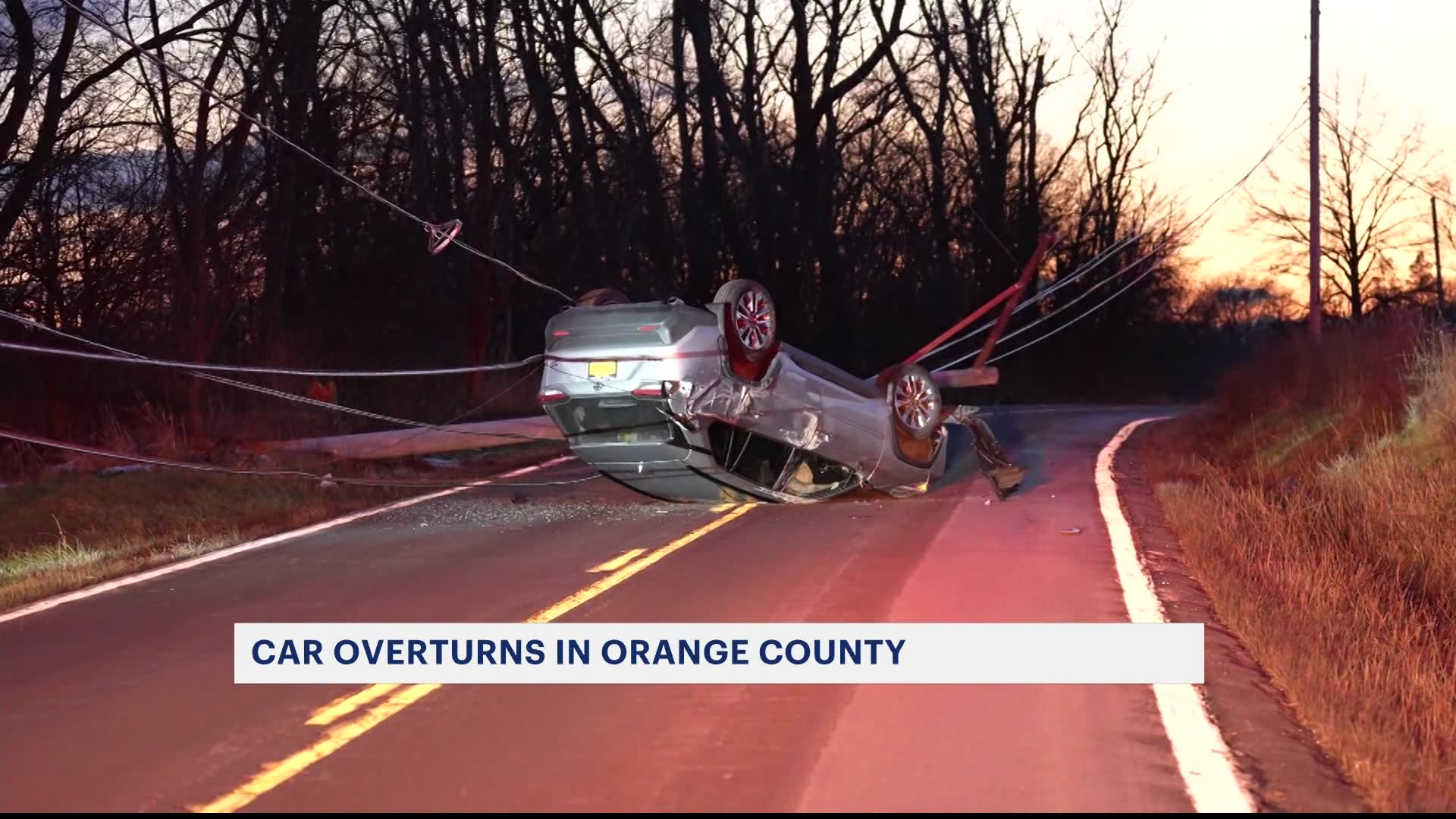 State police: Car flips over onto power lines in Orange County