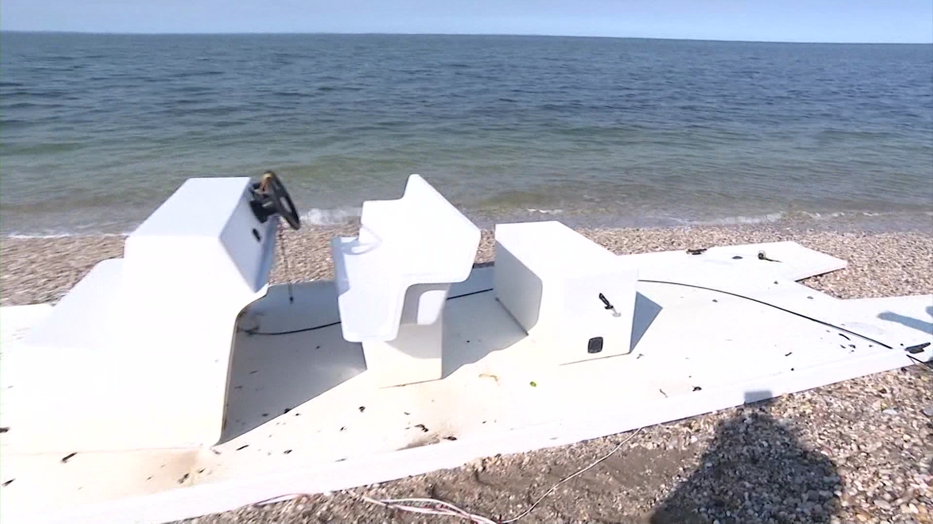 Remnants of capsized boat from CT rowing club washes ashore on Rocky ...