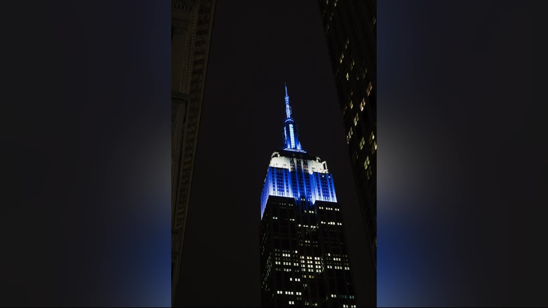 World Trade Center and Empire State Building display blue and white ...