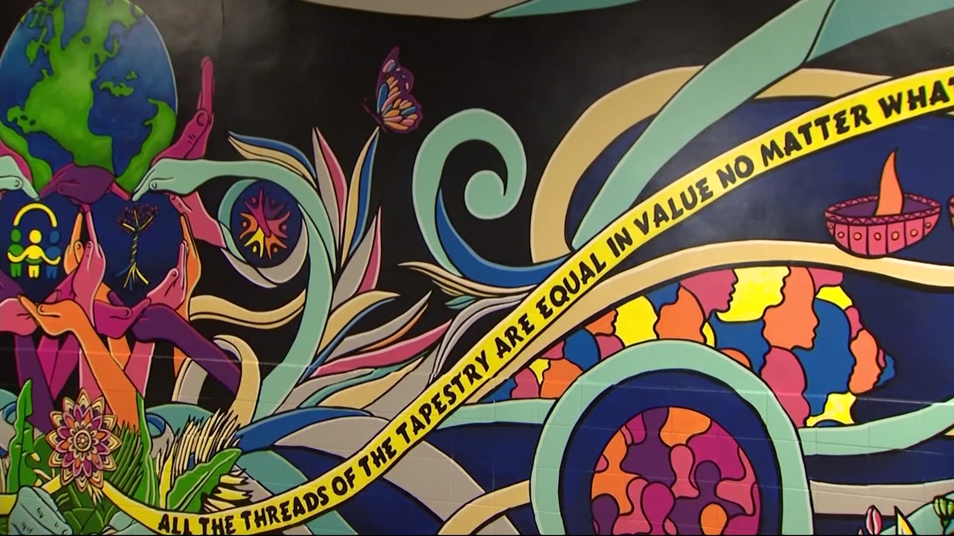 Hasting HS students unveil mural to celebrate multiculturalism