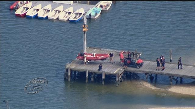 Boy struck by boat propeller dies in Centerport