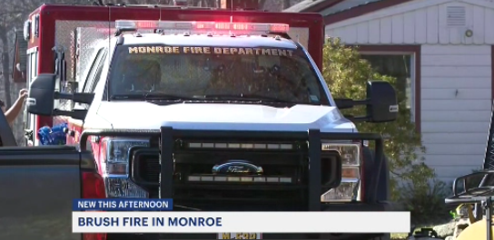 Officials: 10-acre brush fire burns in Monroe