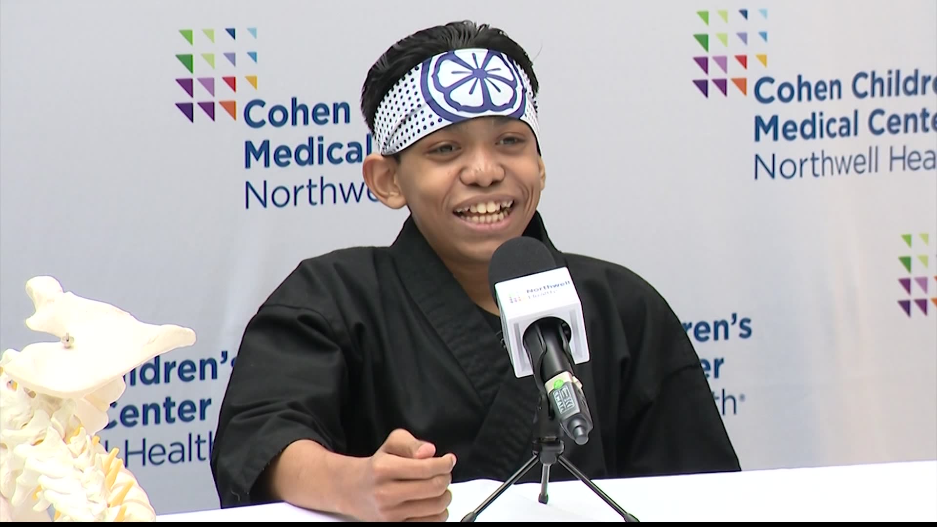 Karate kid back and kicking following surgery for severe scoliosis in ...