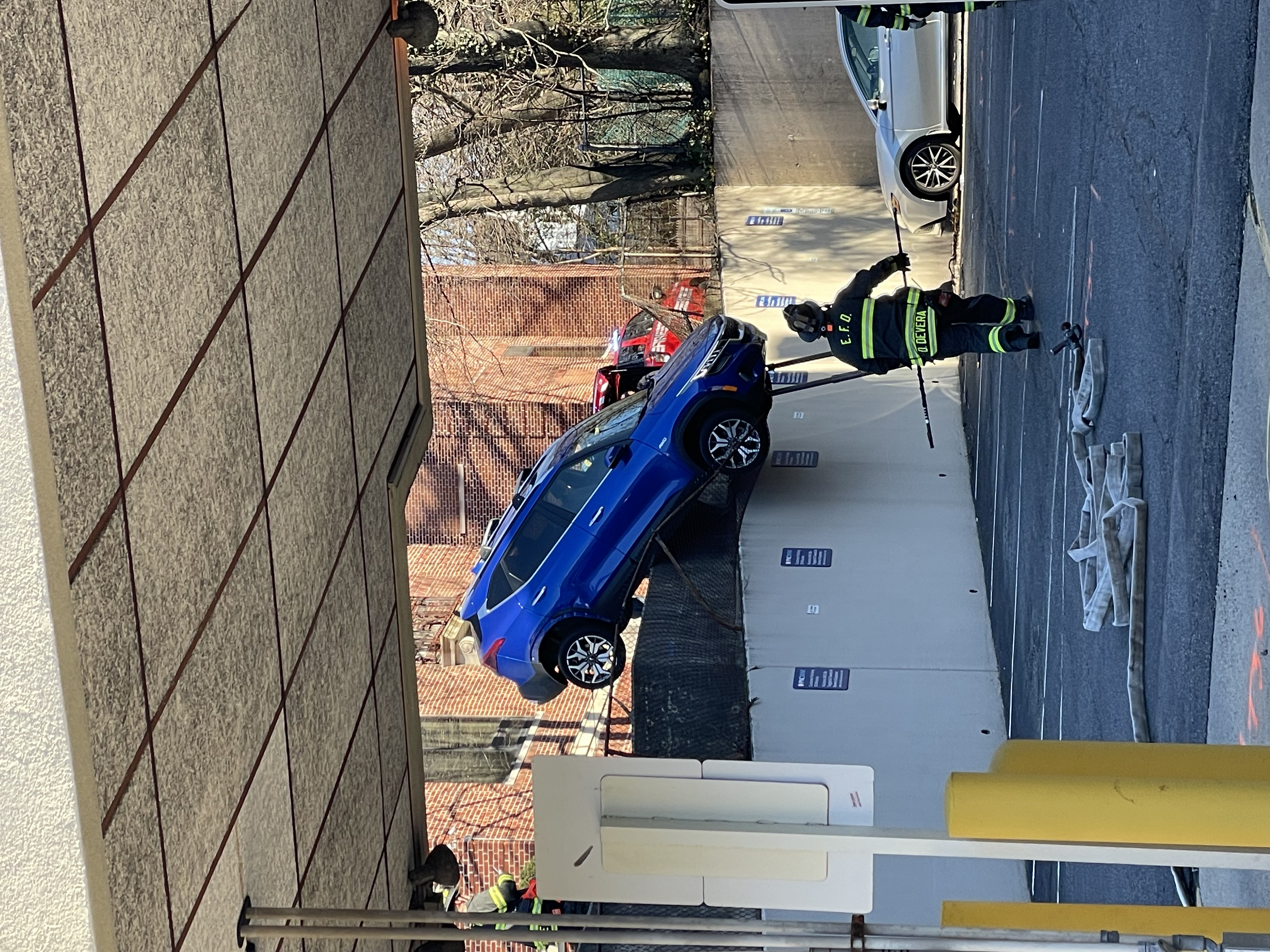 Incredible pictures: Accident in Englewood leaves car dangling off ledge