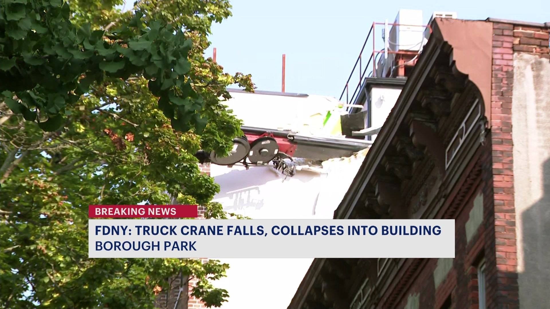 FDNY: Truck boom falls onto house in Borough Park