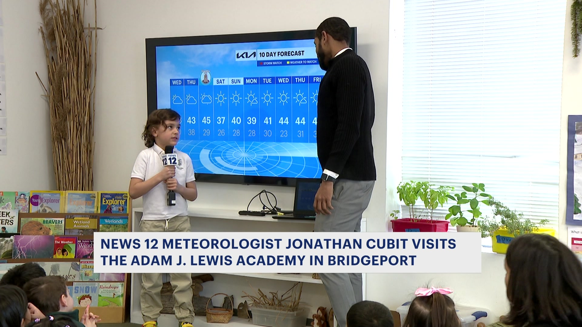 Jonathan Cubit visits students at the Adam J. Lewis Academy