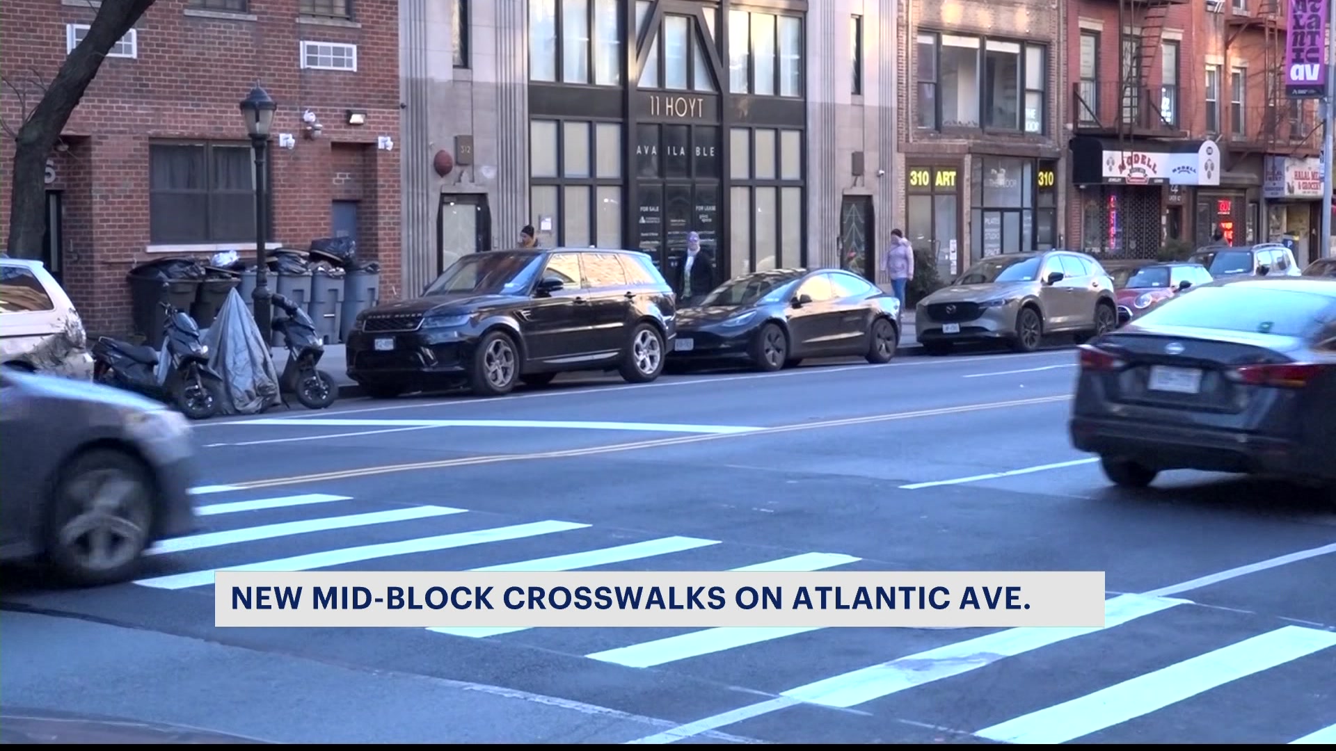 NYC DOT installs mid-block crossings on Atlantic Avenue