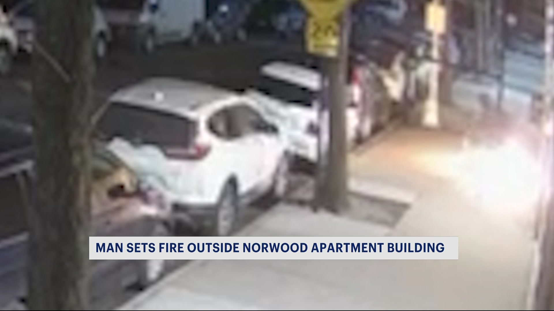 Surveillance video shows man setting fire outside Bronx apartment building