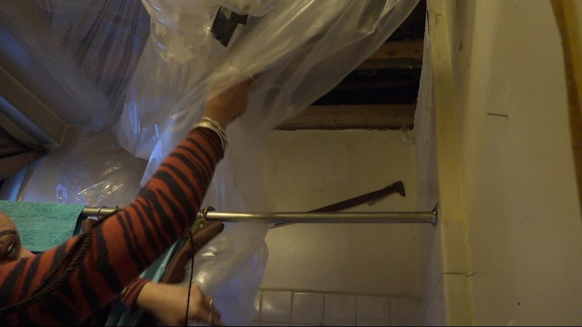 Fordham woman taking legal action after bathroom ceiling collapse