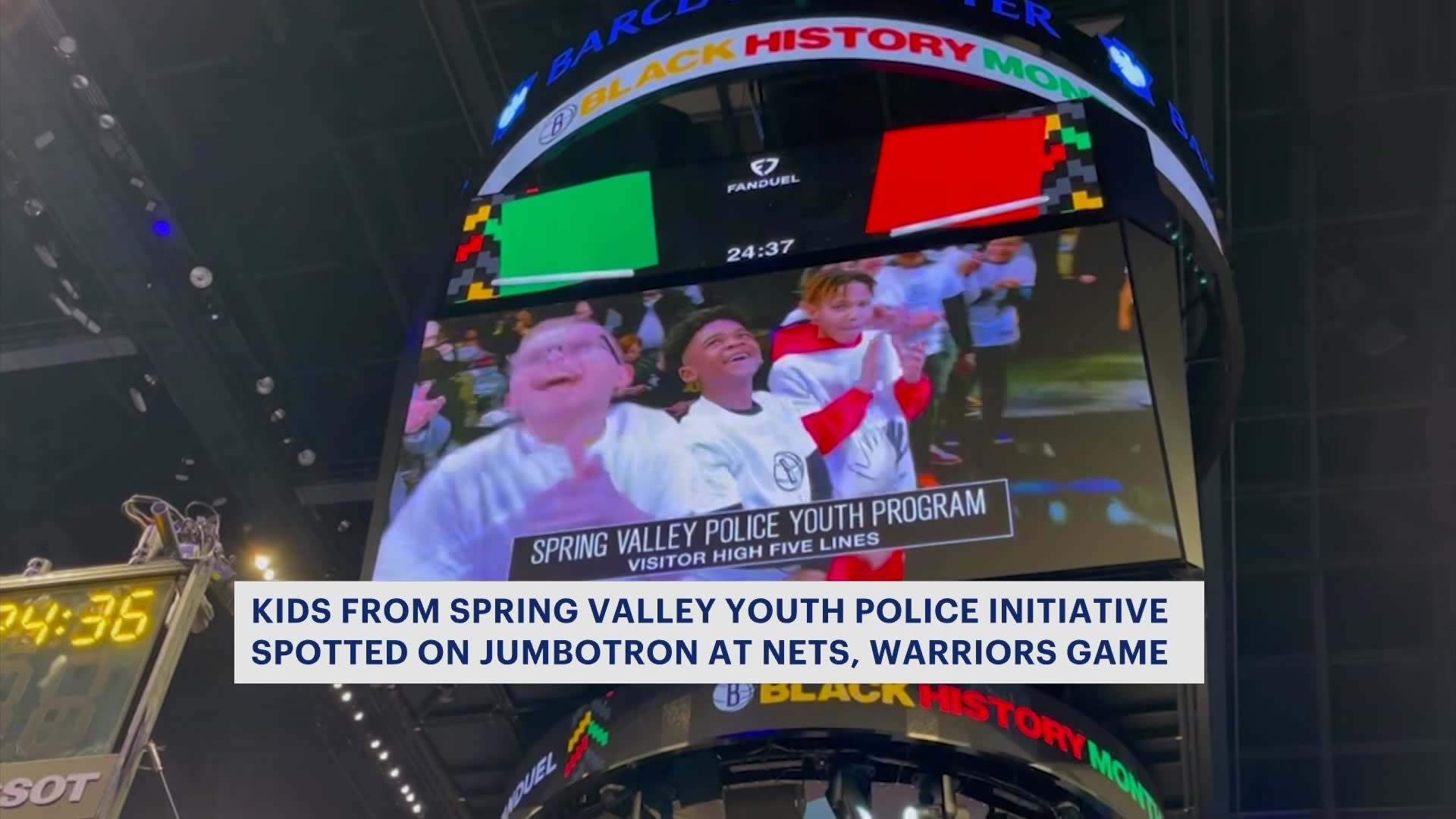 Spring Valley kids featured on the jumbotron at Nets game